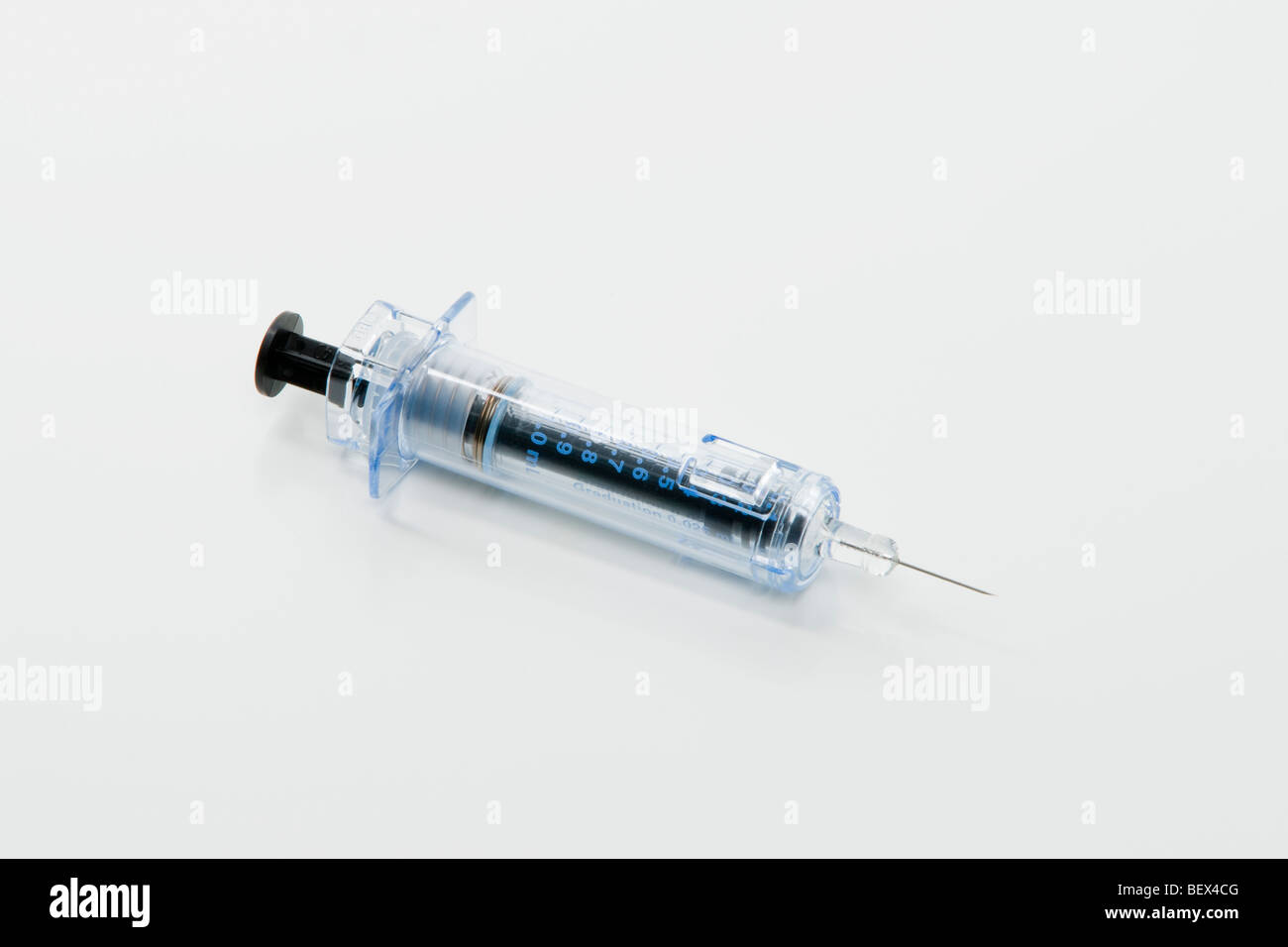 single use syringe with safety mechanism retracted Stock Photo - Alamy