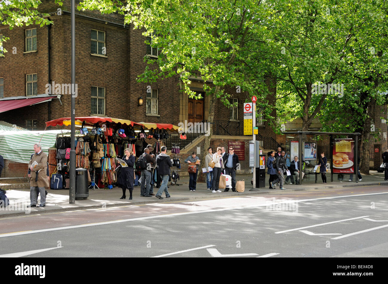 Bus Stop Tottenham Court Road with stall behind London England UK Stock ...