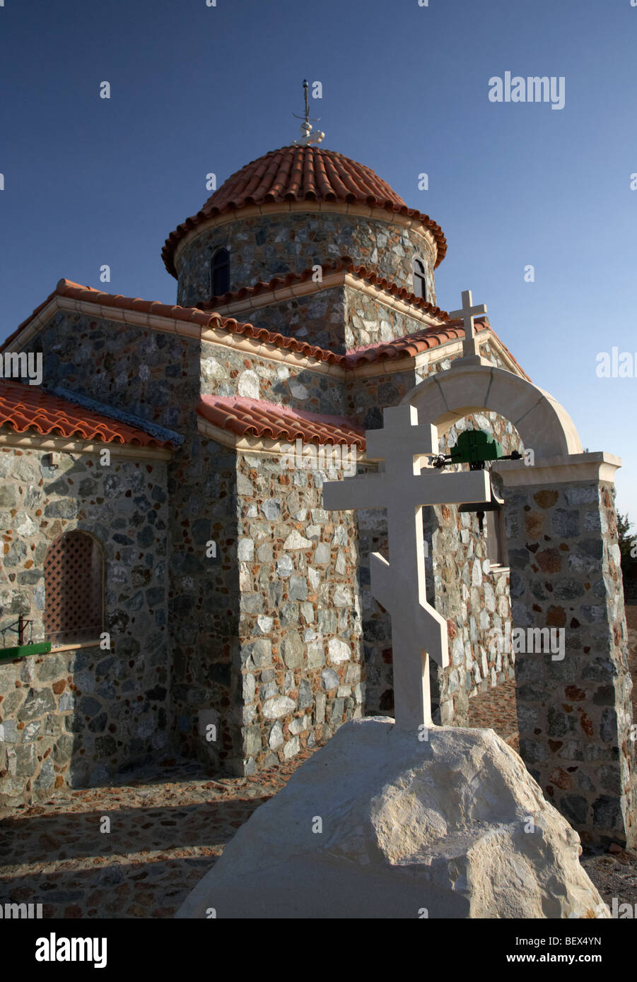 greek orthodox cross in front of Church of All Saints of Cyprus at the ...