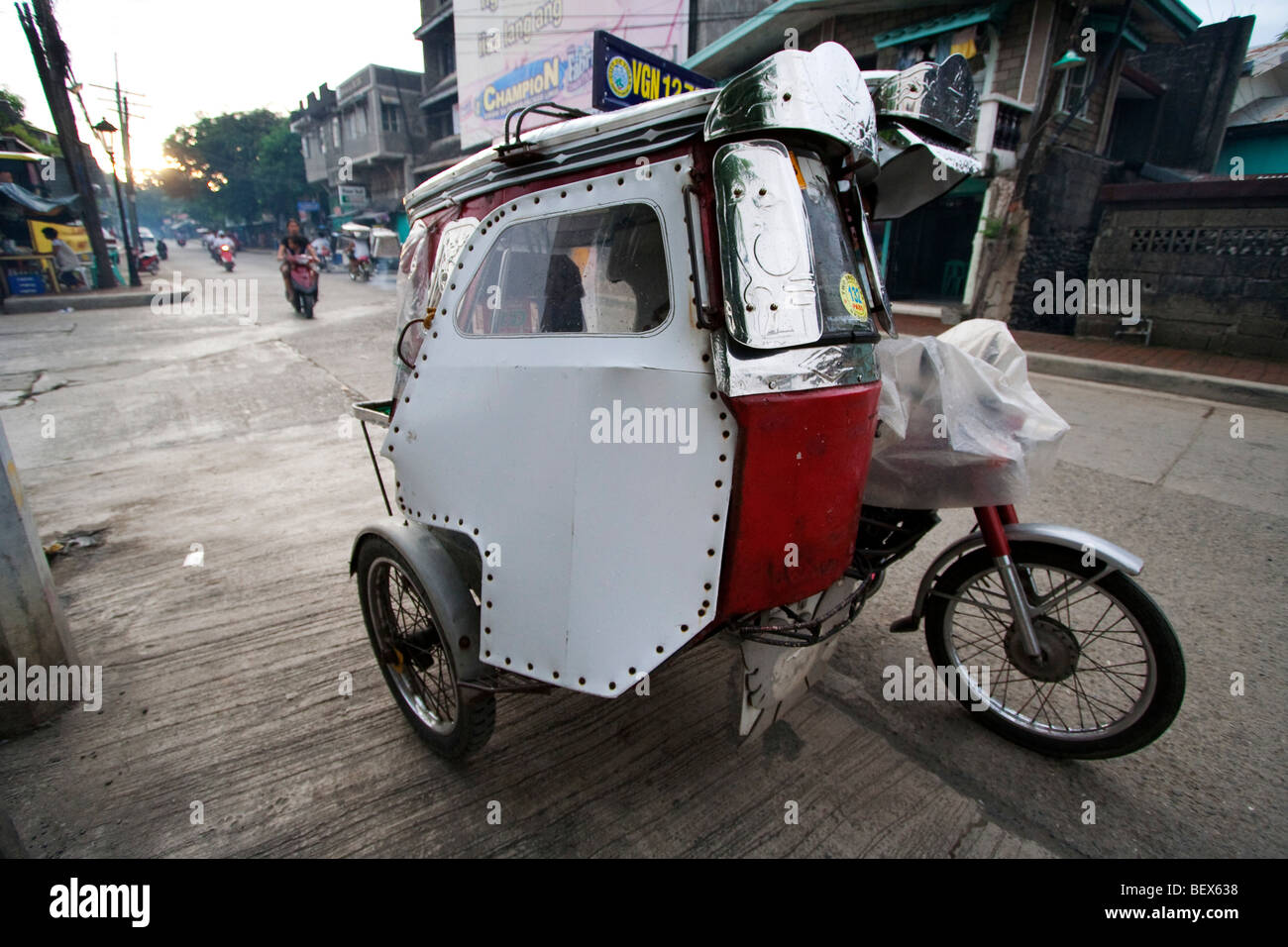 A tricycle (motorized rickshaw) in Vigan City Stock Photo - Alamy