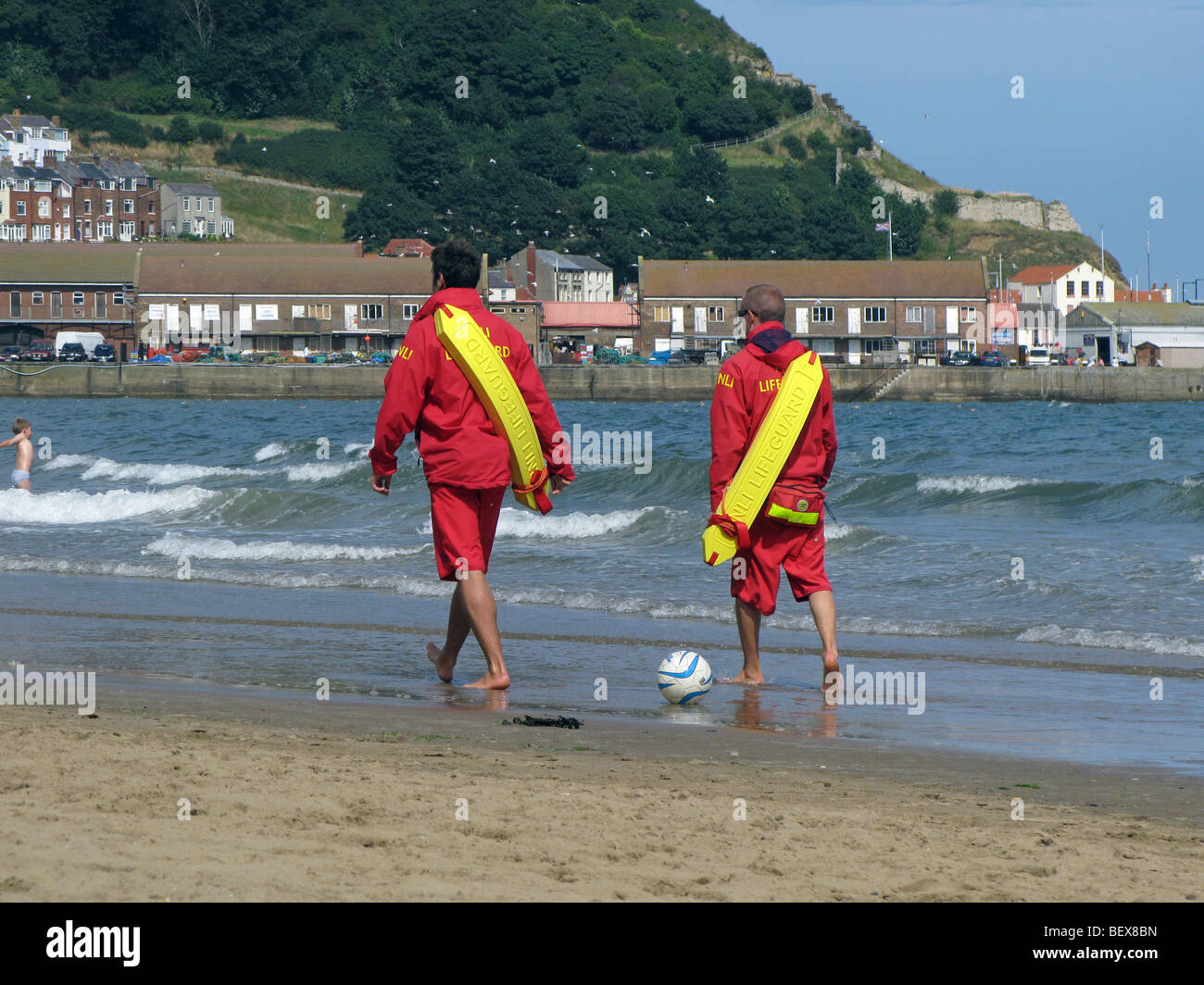 Lifeguards patrolling the beach, Scarborough Stock Photo - Alamy