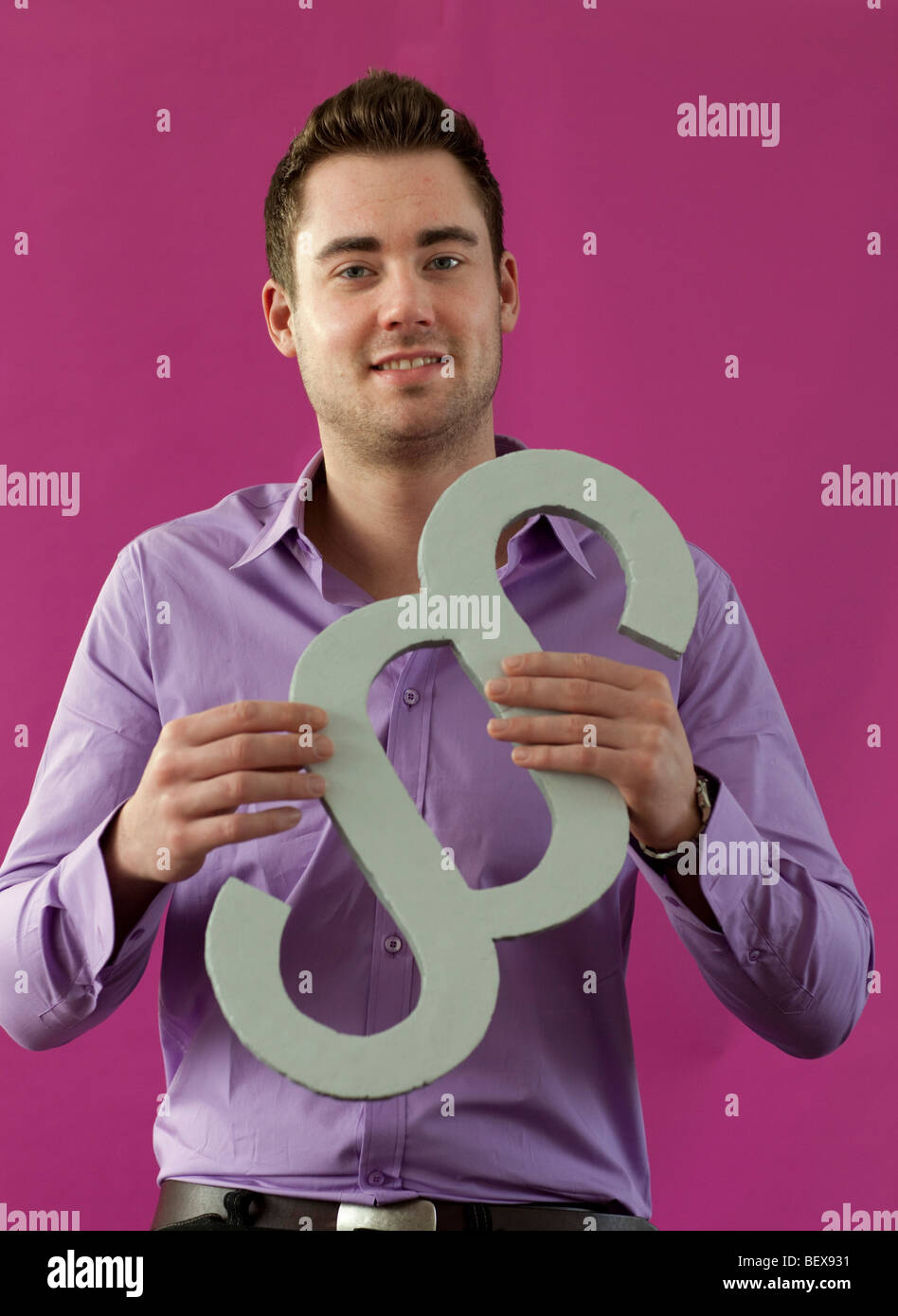 Young man with paragraph Stock Photo - Alamy