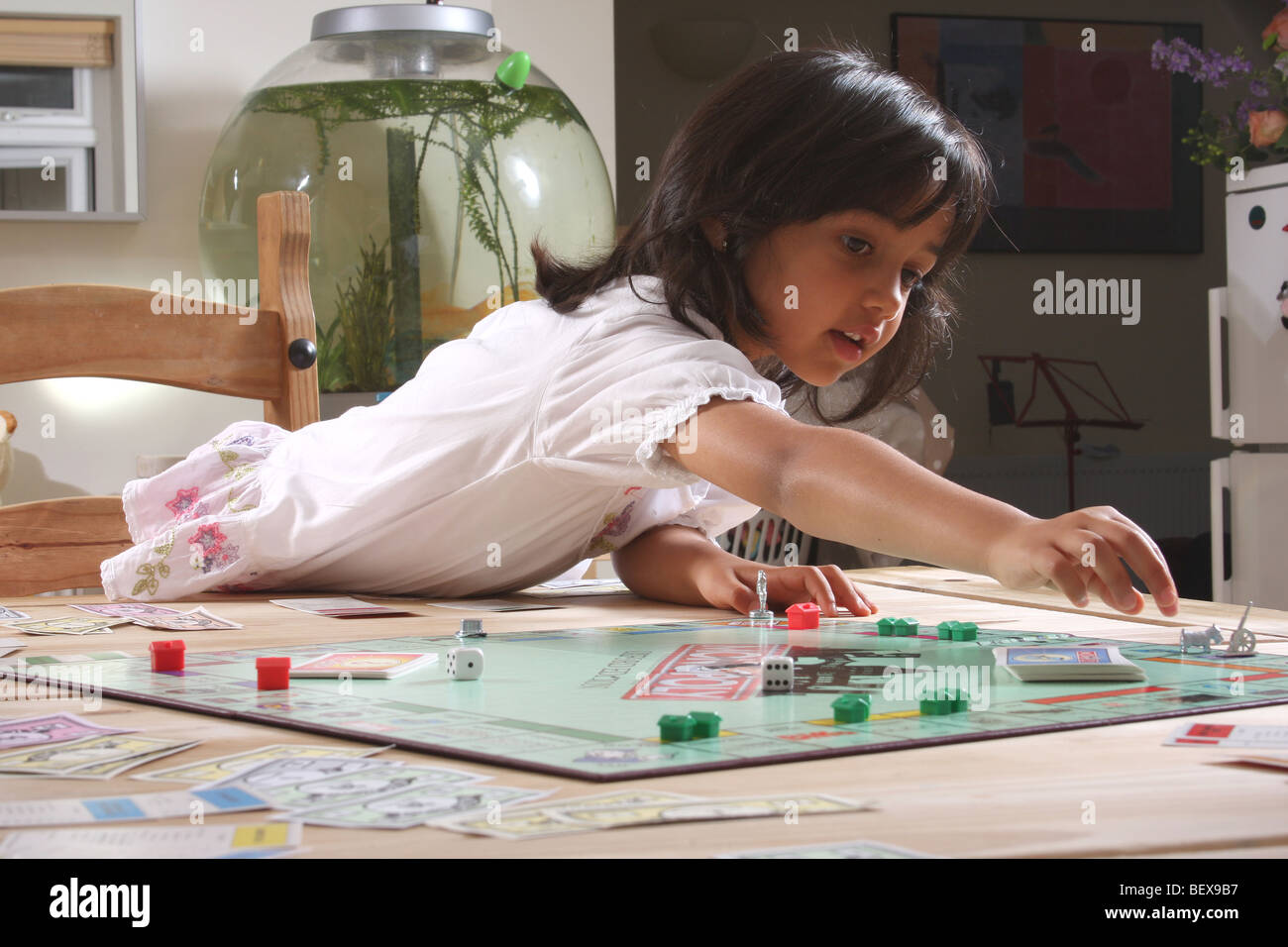 Playing board game kids losing game hi-res stock photography and images ...