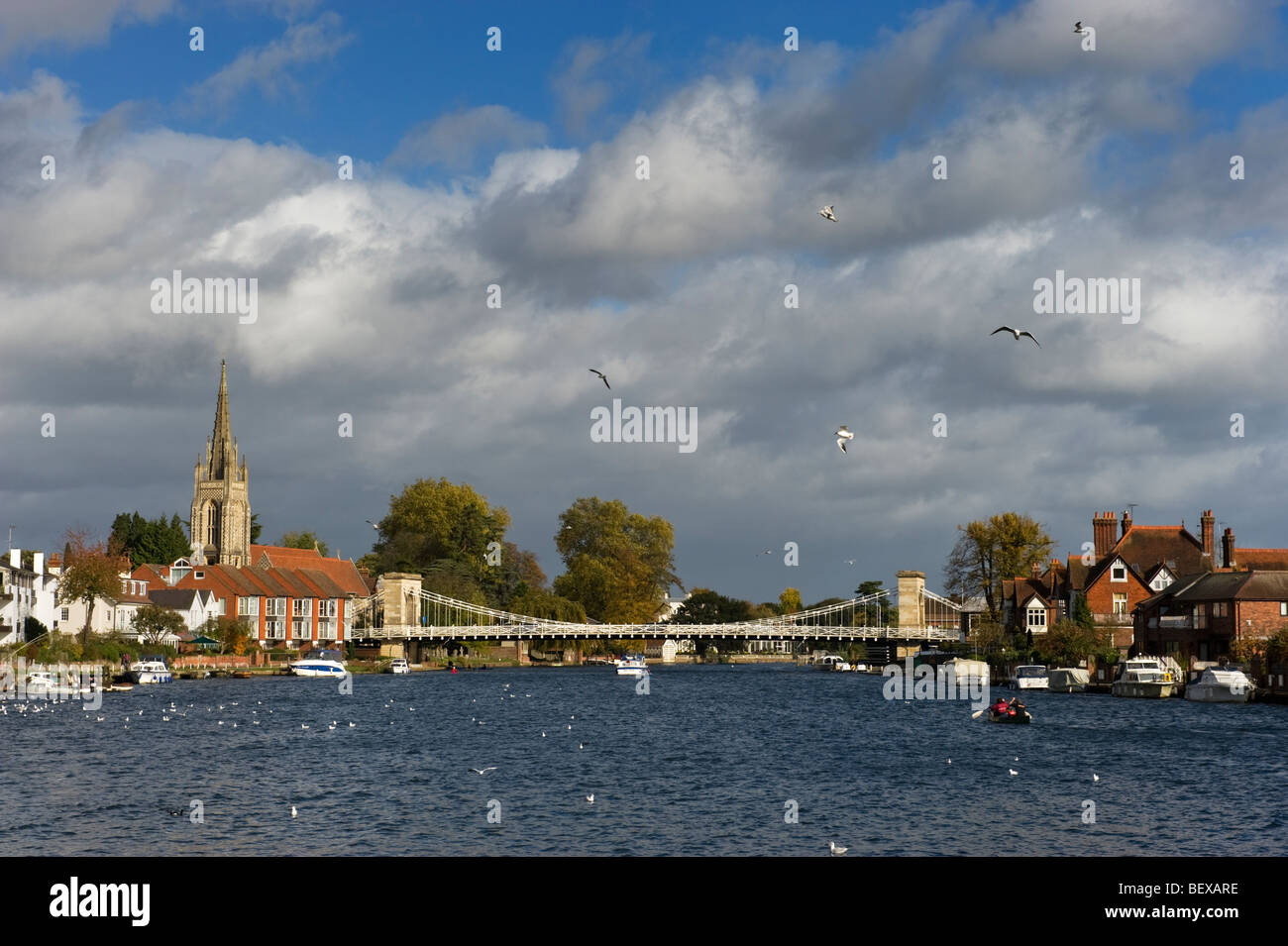 A downstream view of Marlow suspension bridge over the River Thames ...