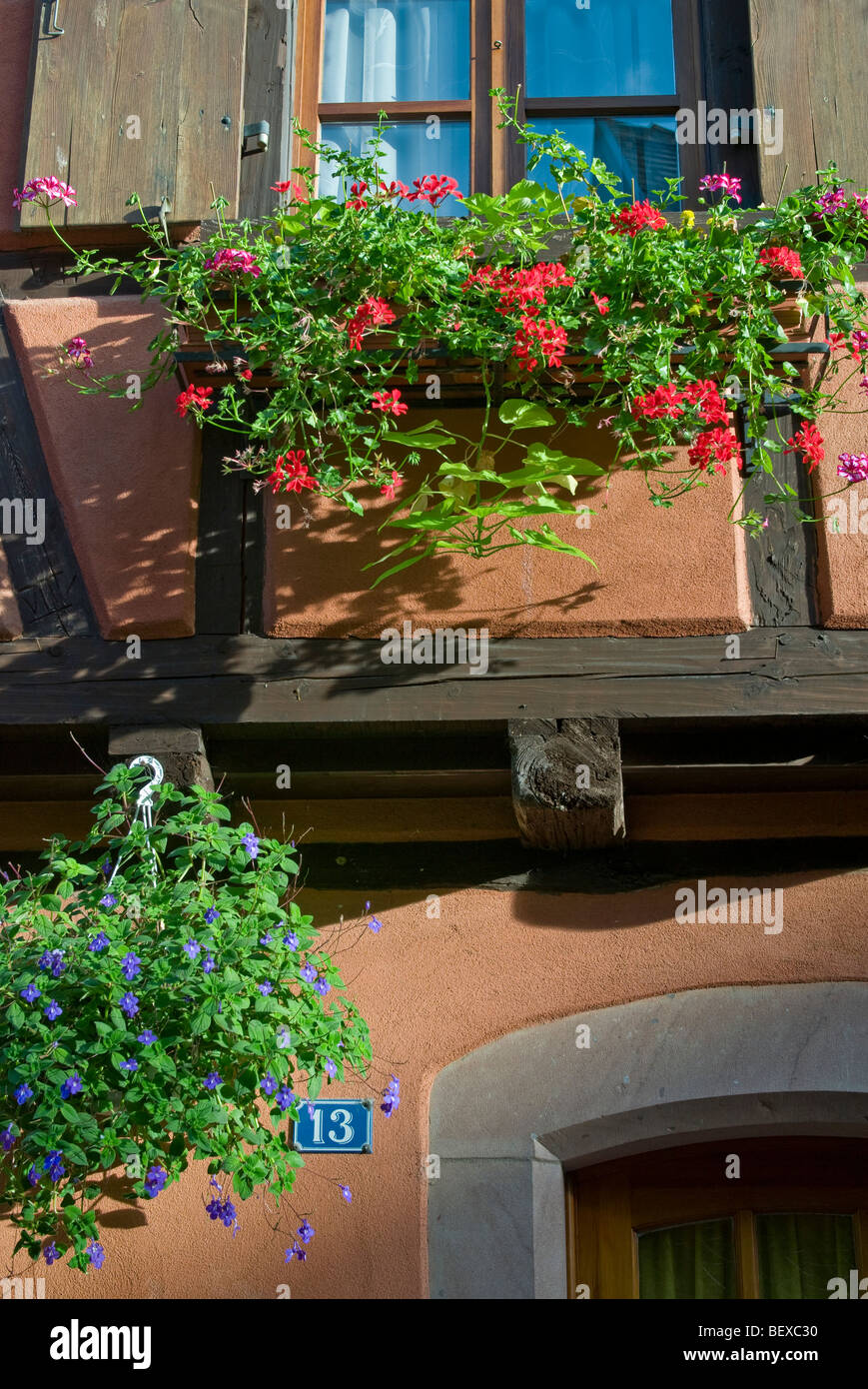 ALSACE GENERIC Colourful window box outside typical traditional half ...