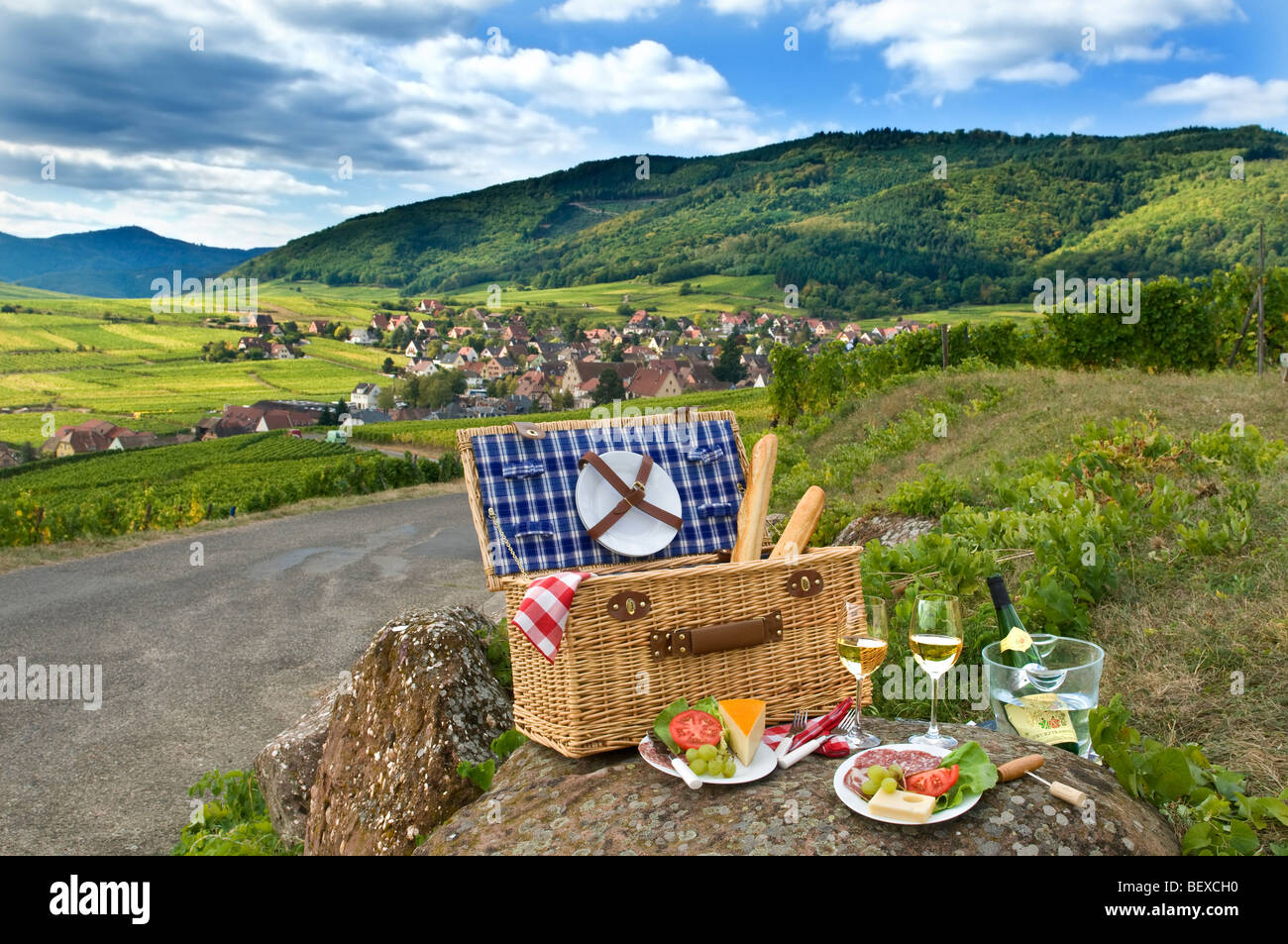 Riquewihr Alsace Roadside picnic in the vineyards above the medieval ...