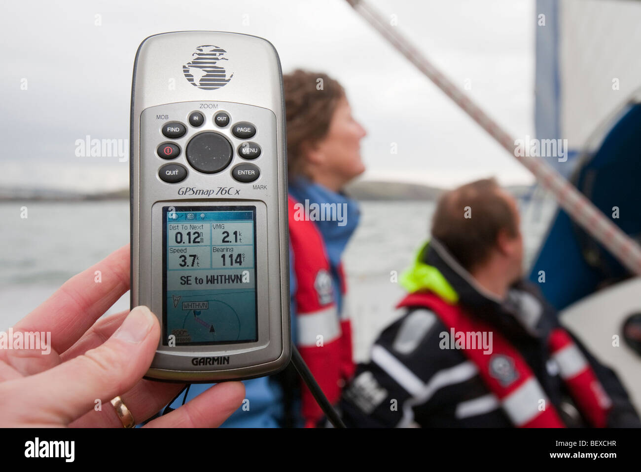 A sailor using a GPS on a sailing boat off the Cumbrian coast for ...
