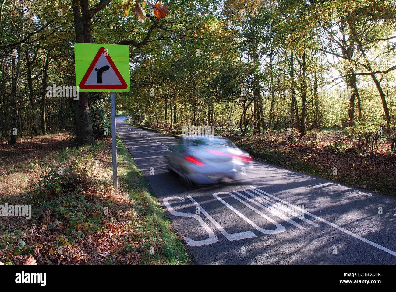 Driving Bend in Road Stock Photo - Alamy