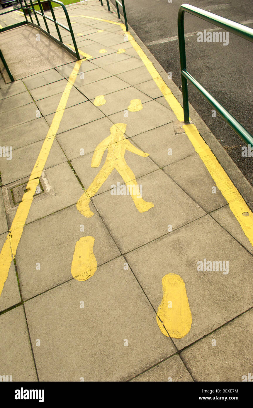 Footpath at roadside in school grounds Stock Photo - Alamy