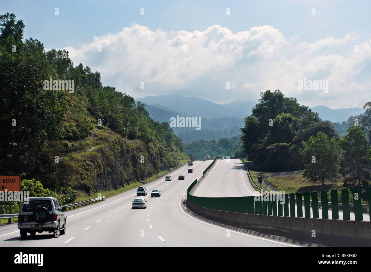Road cutting through mountain hi-res stock photography and images - Alamy