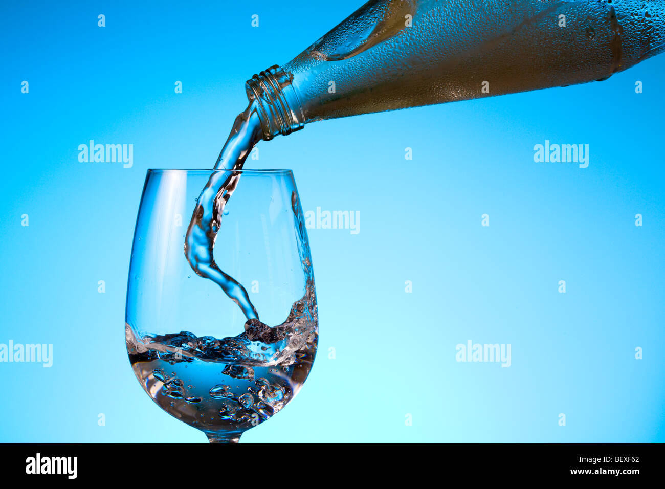 Water pouring pour glass bottle hi-res stock photography and images - Alamy
