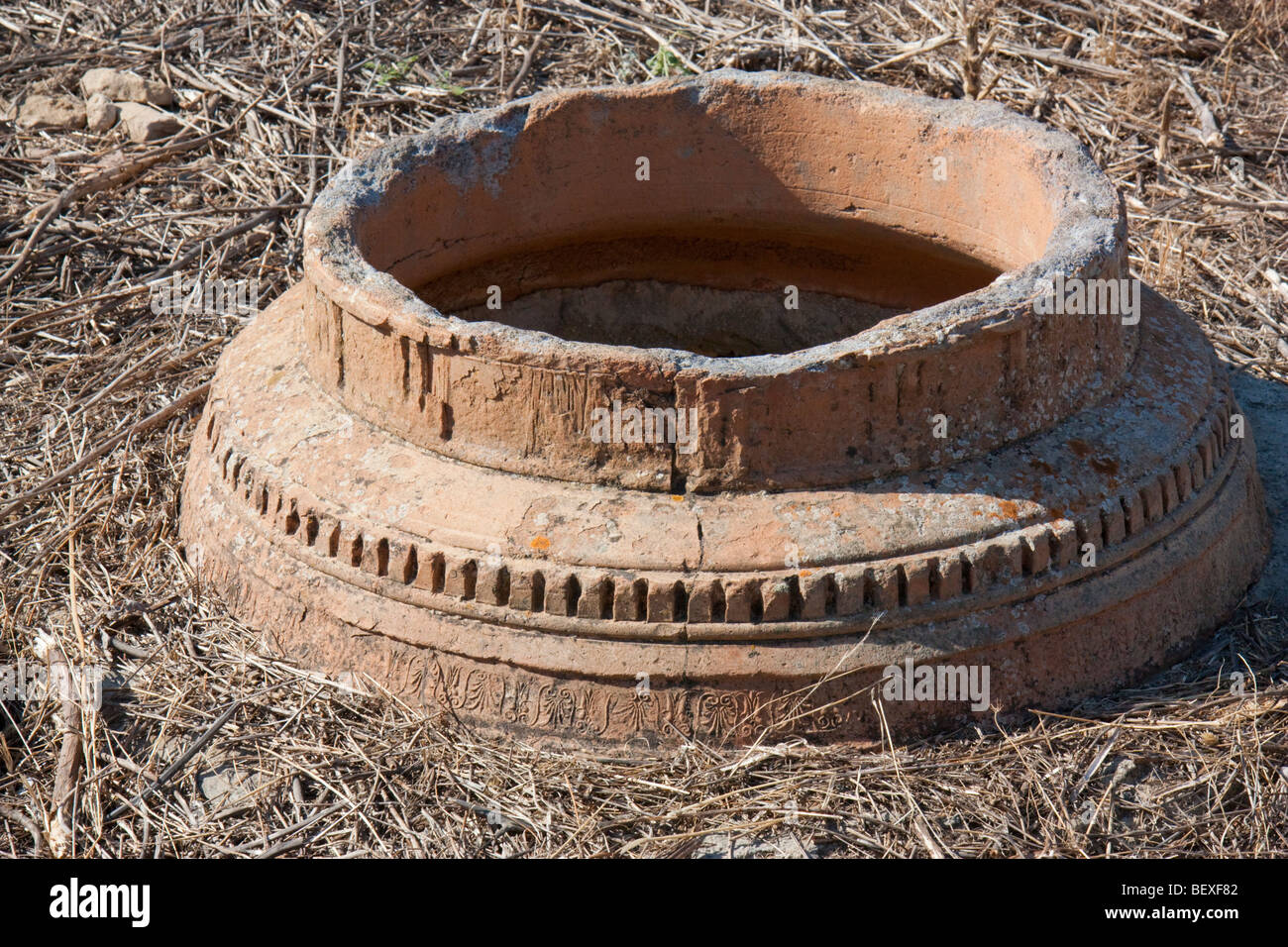 An ornate storage pithos in situ at Megara Hybleia, Sicily Stock Photo ...