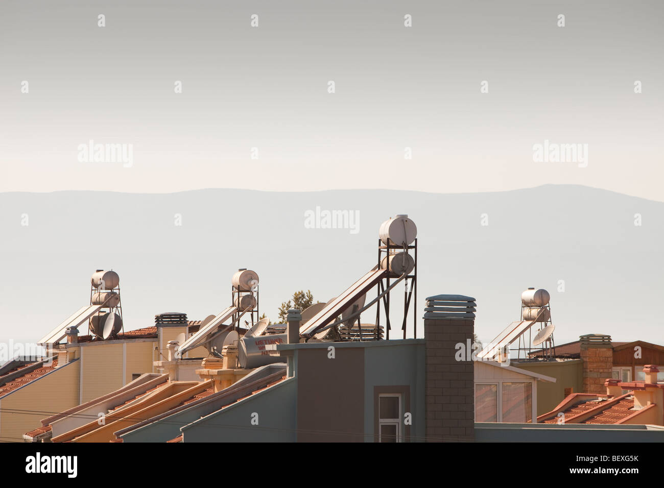 Solar water heaters on houses in Teos, in Western Turkey Stock Photo ...