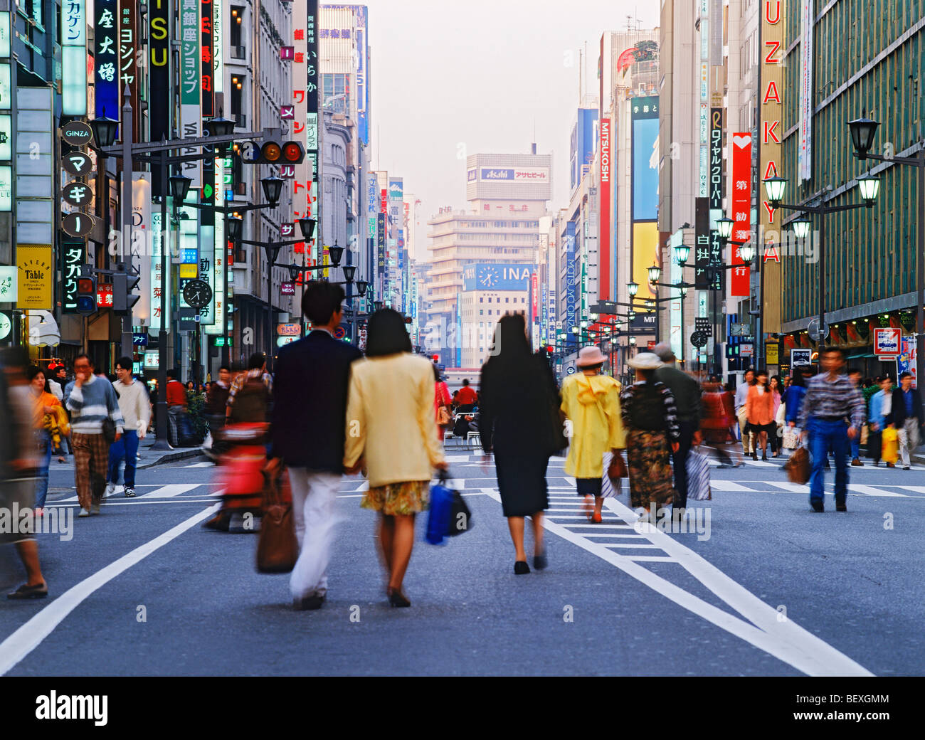 People walking main street through Ginza in Tokyo Japan Stock Photo - Alamy