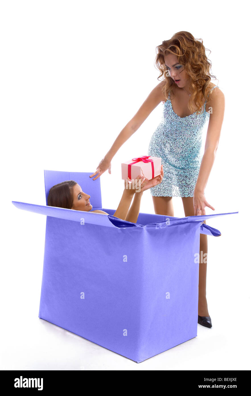 Girl inside a box Cut Out Stock Images & Pictures - Alamy