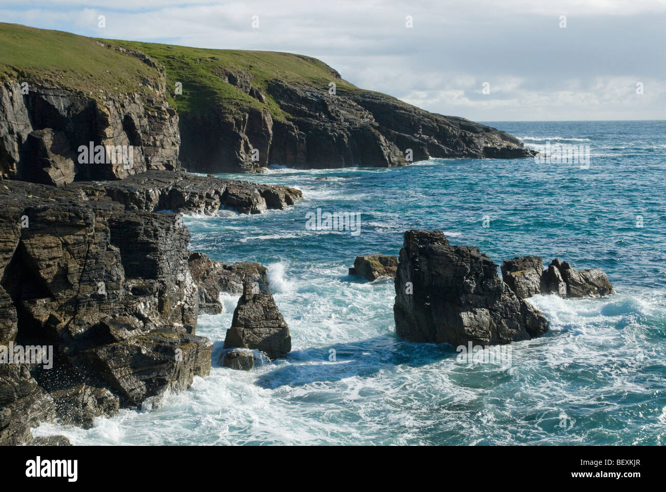 Cliffs and rocks by the sea near Port of Ness, Isle of Lewis, Scotland ...
