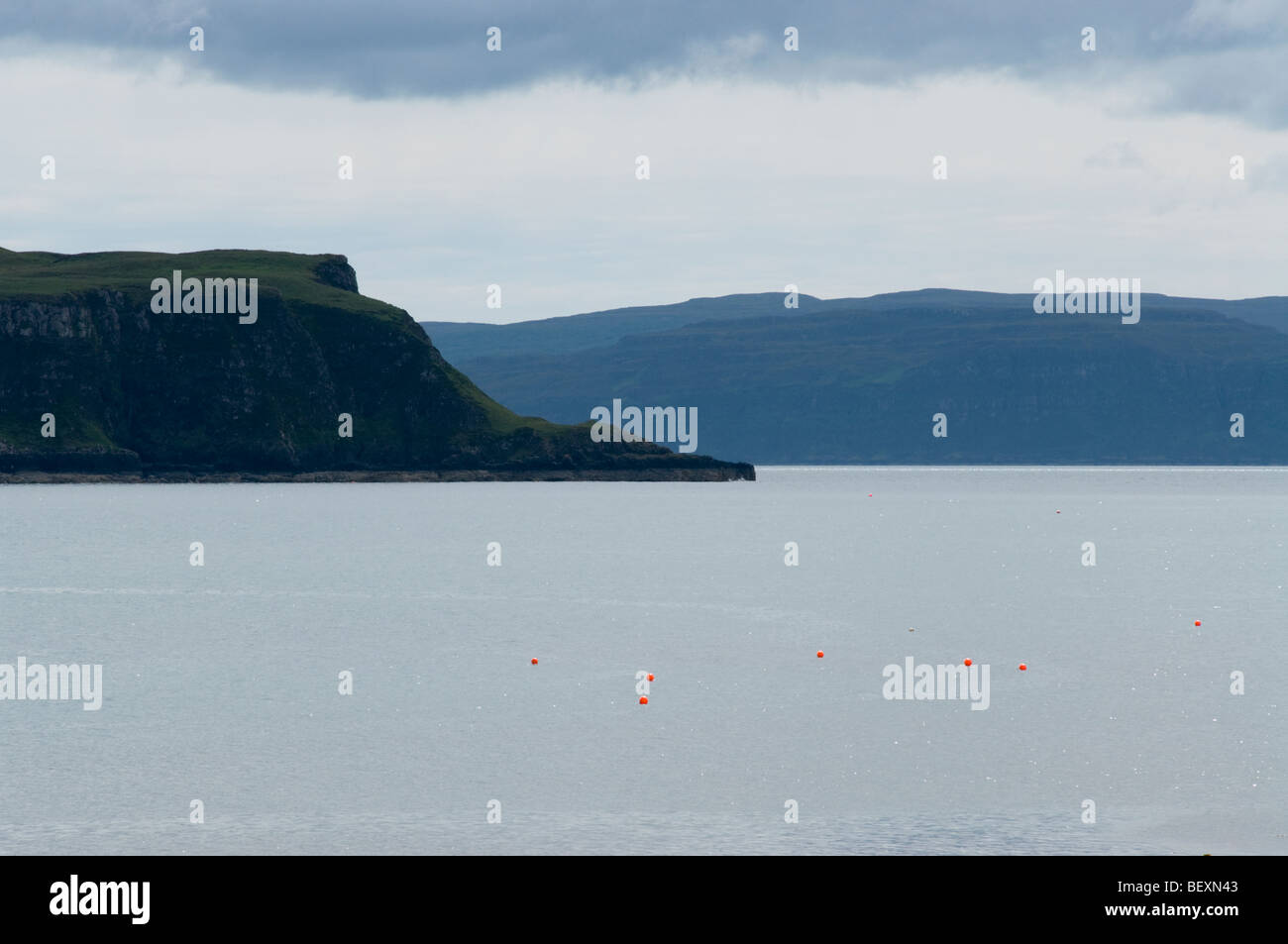 A pattern of orange marker floats in the sea at Uig, Skye Scotland ...