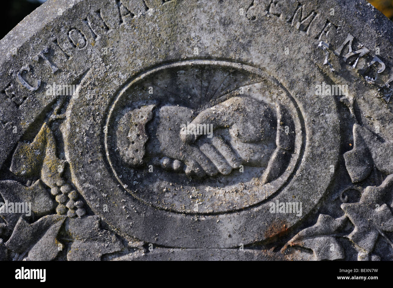 " Affectionate remembrance " . Detail of gravestone with handshake ...