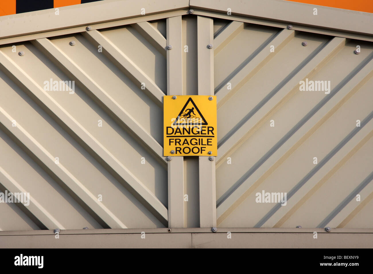 Sign on Fragile Roof Stock Photo - Alamy