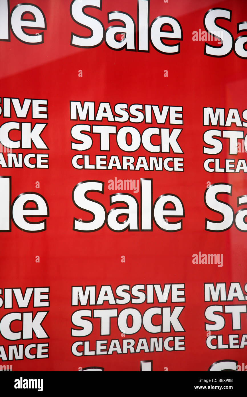 Sale sign in shop window Stock Photo - Alamy