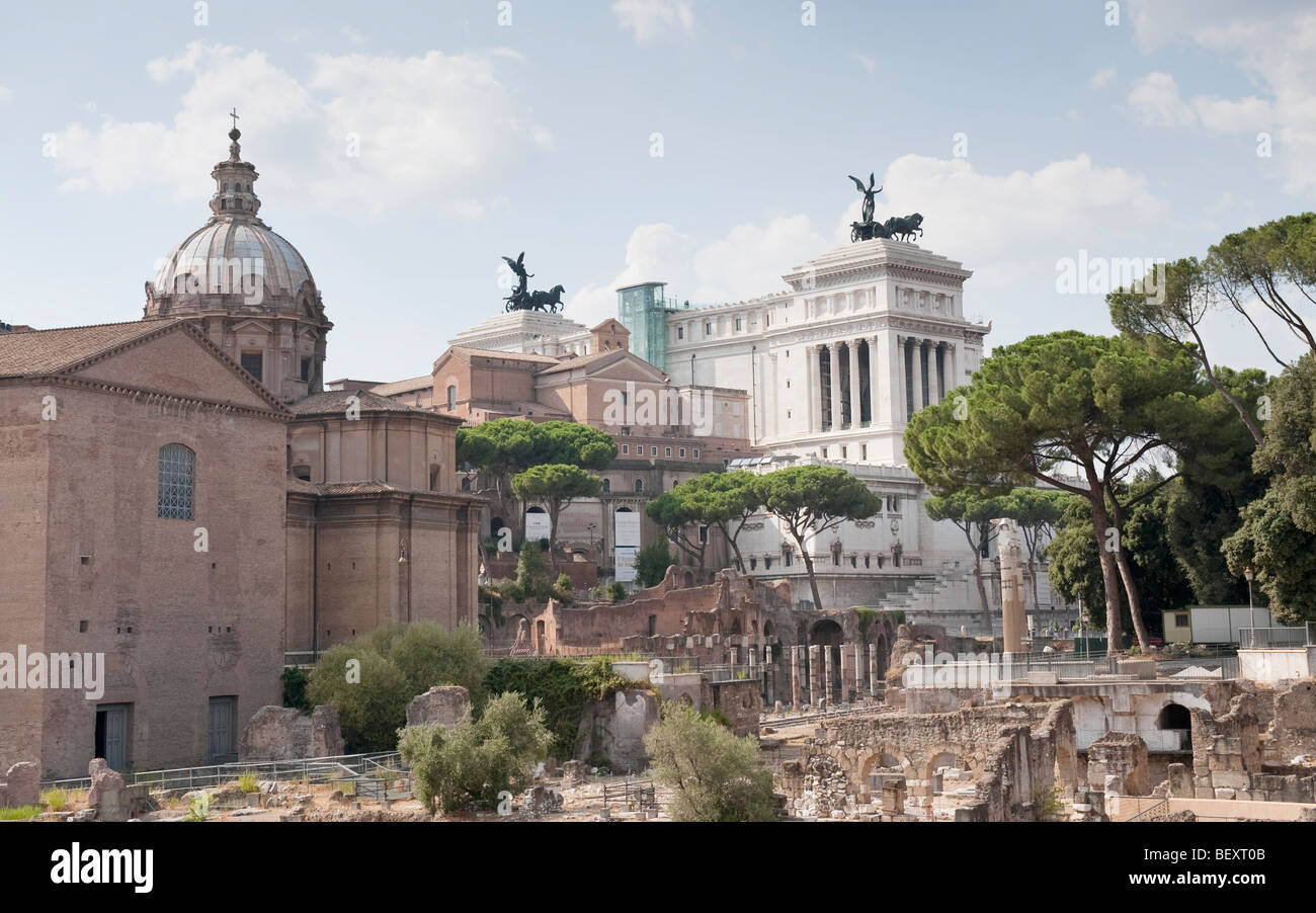 A wide view of the forum in Rome, Italy, showing some of the ruins and ...
