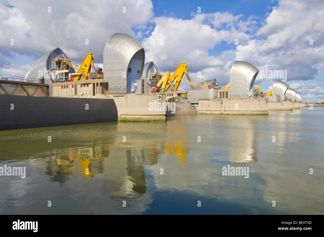 The Thames Barrier on the down stream side with the gates in the raised ...