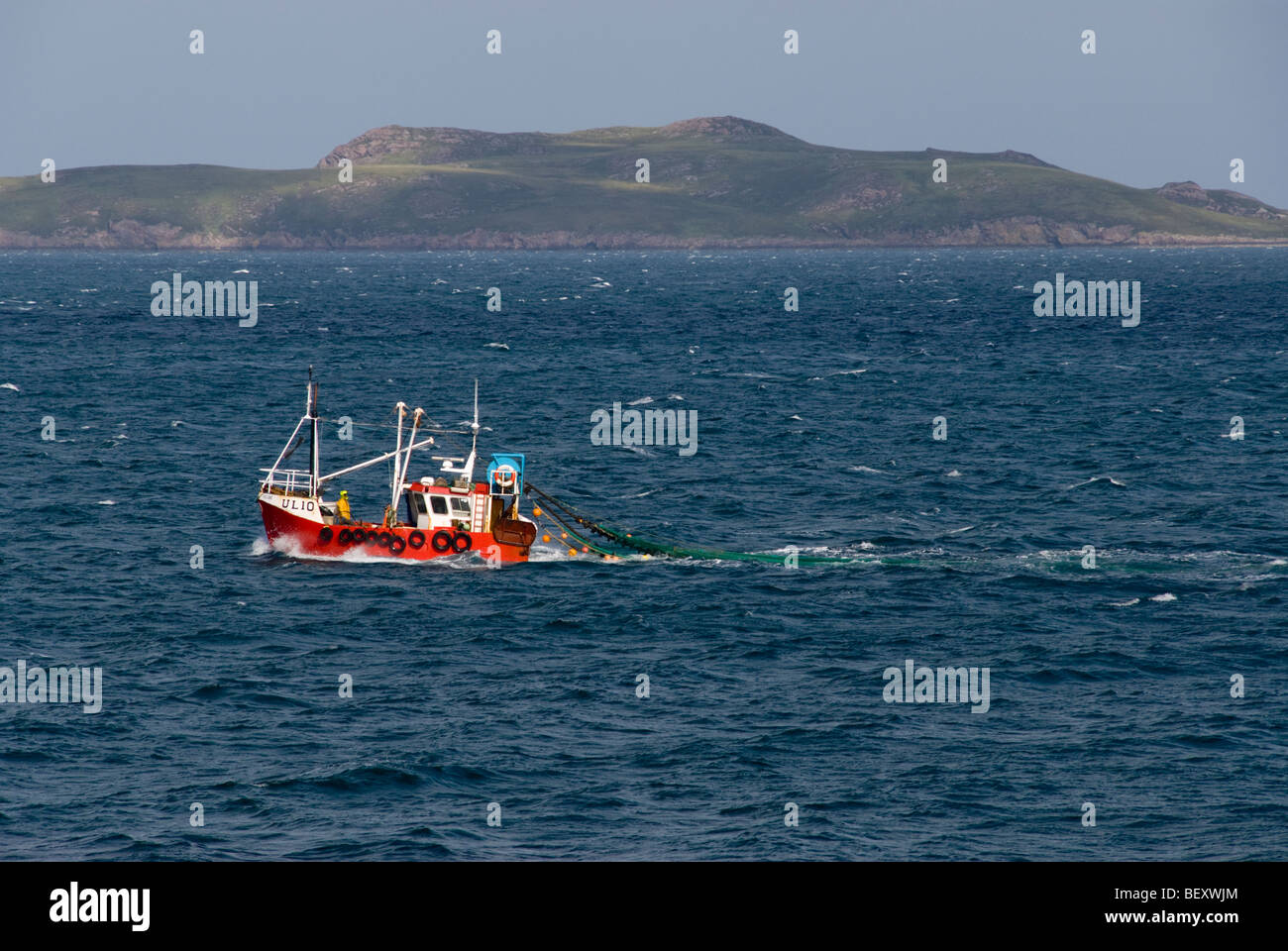 Fishing boat pulling net in the Minch near Ullapool, Scotland Stock ...