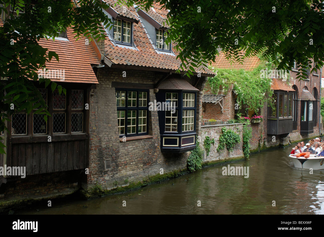 Tourboat on Dijver canal. Brugge,(the Venice of the North). Western ...