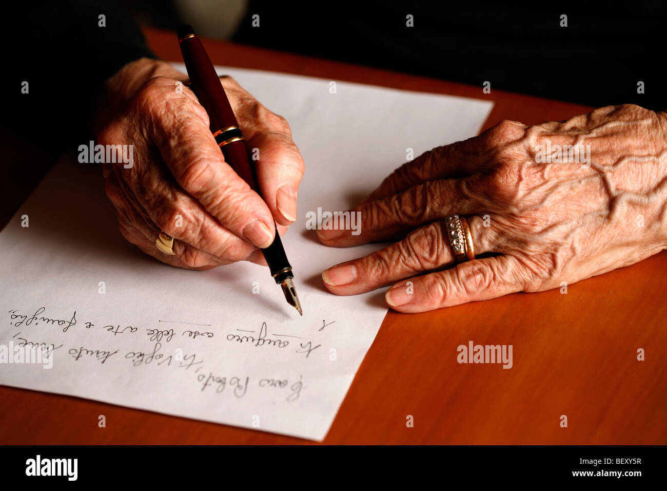 elderly woman write a letter Stock Photo - Alamy