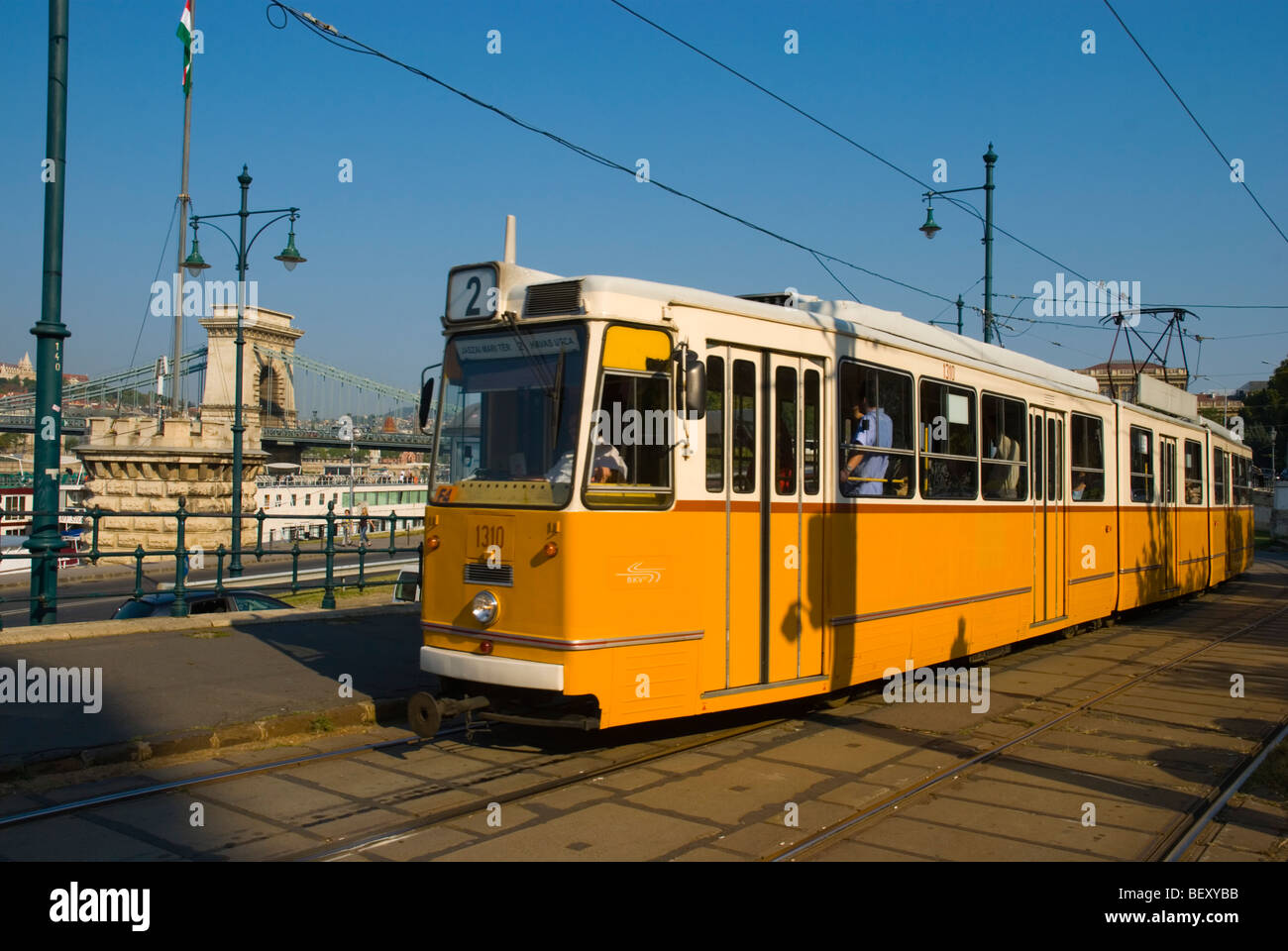 Historical tram line 2 moves along the Danube River in central Budapest ...