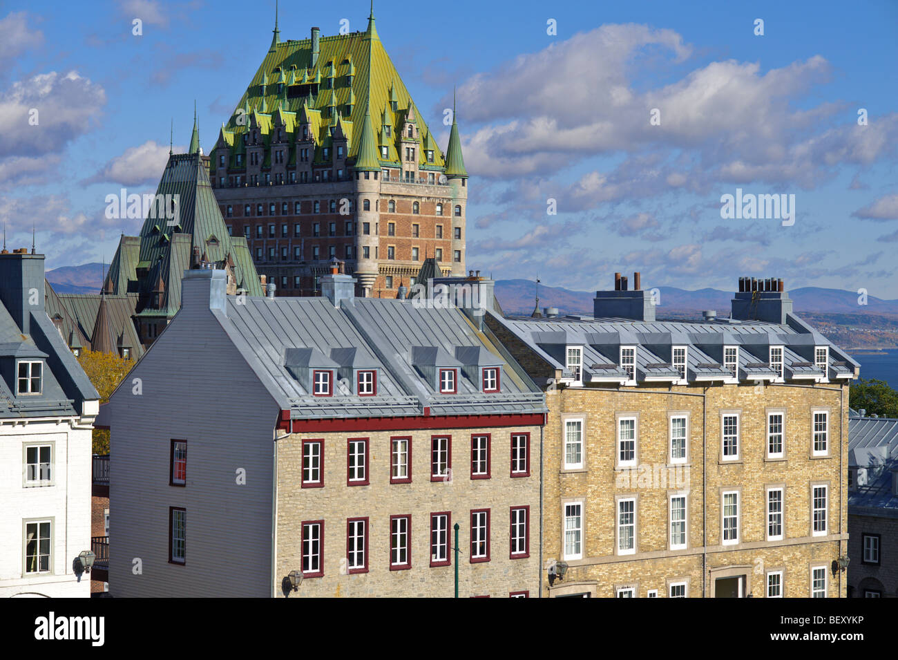 Chateau Frontenac with old Quebec style architecture with blue sky in ...