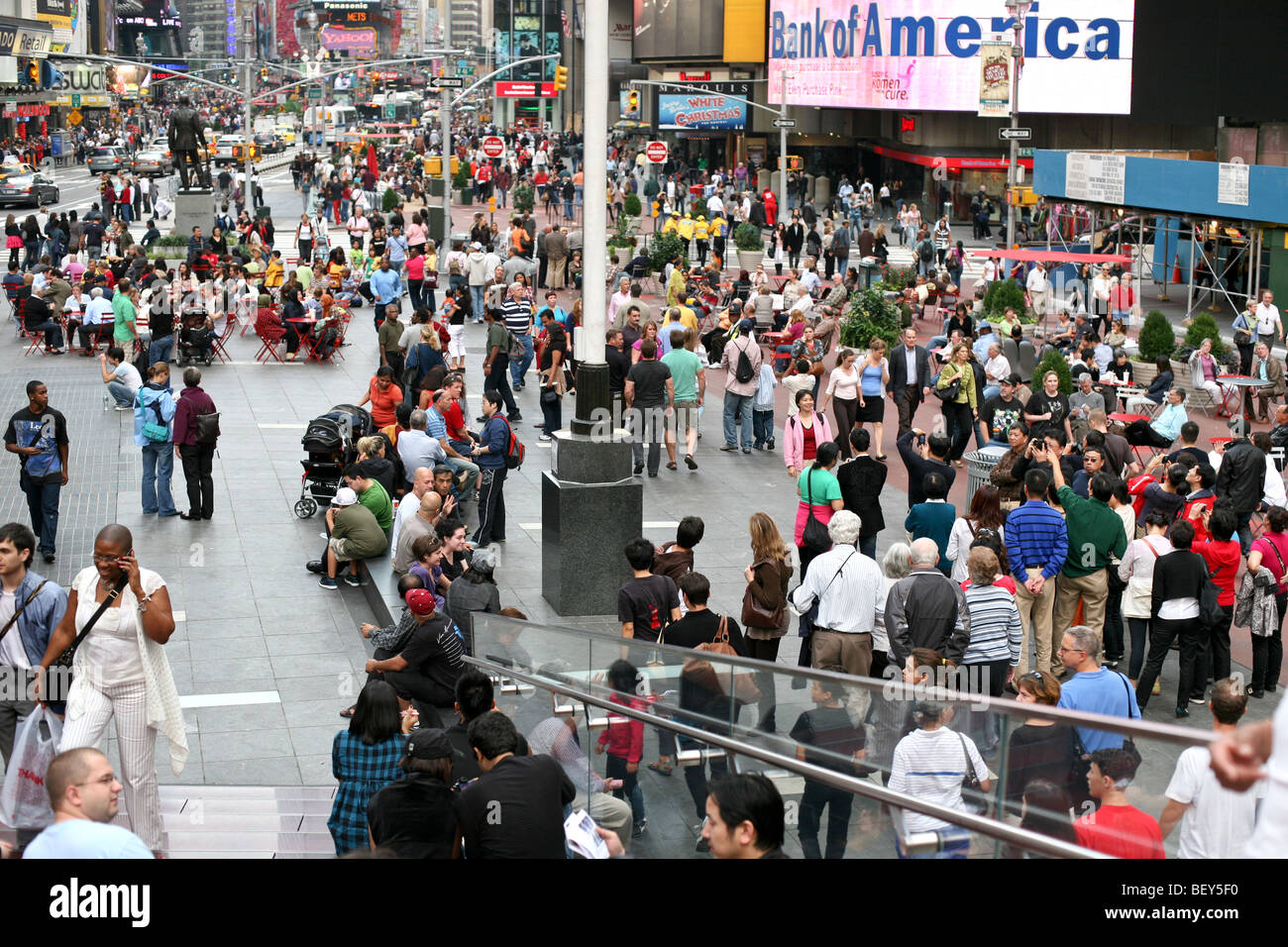 view down Broadway as colorful crowds of multiethnic multicultural ...