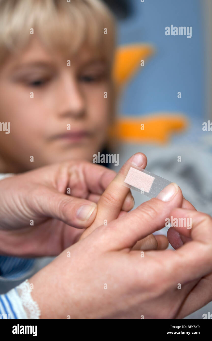 boy with plaster on the finger Stock Photo - Alamy