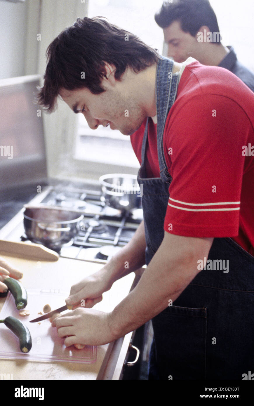 young men cooking Stock Photo - Alamy