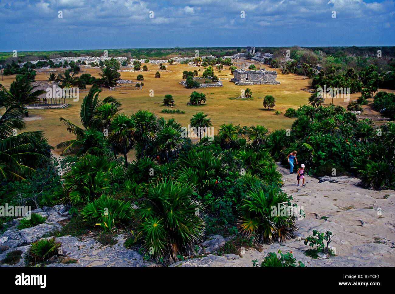 people tourists visiting pre-Columbian Mayan ruin Mayan ruins at Tulum ...