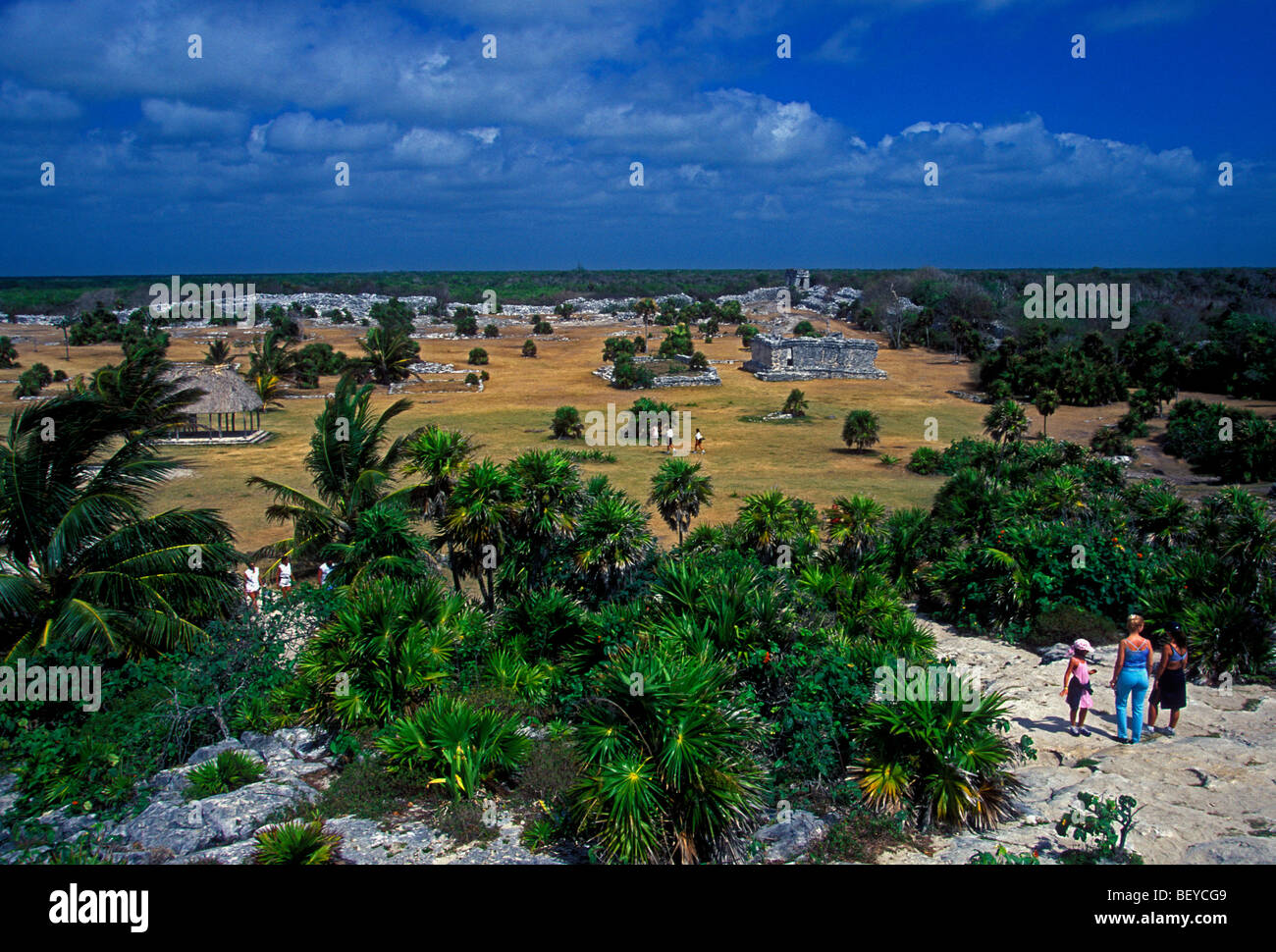 people tourists visiting pre-Columbian Mayan ruin Mayan ruins at Tulum ...