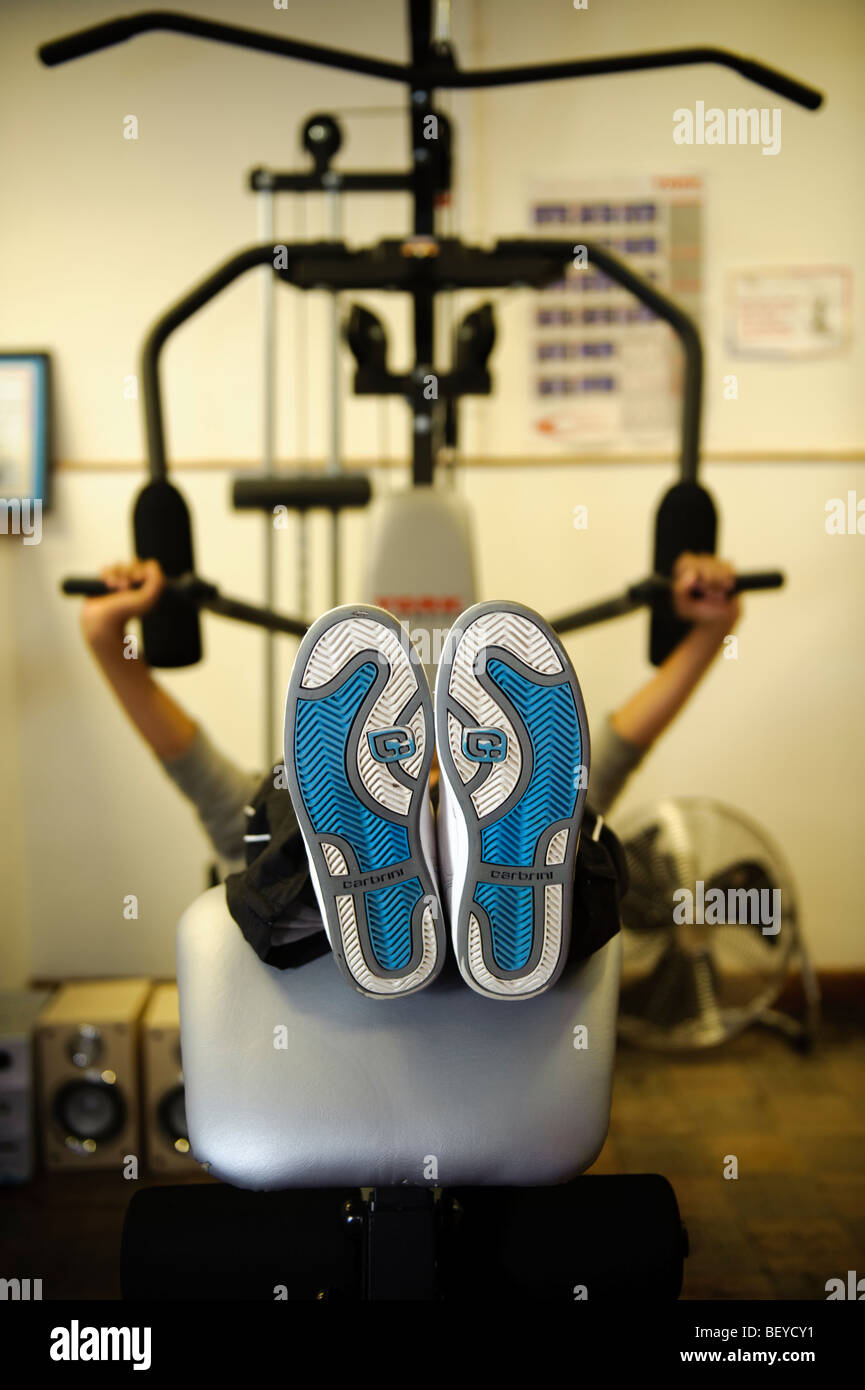 Teenage boy lifting weights hi-res stock photography and images - Alamy
