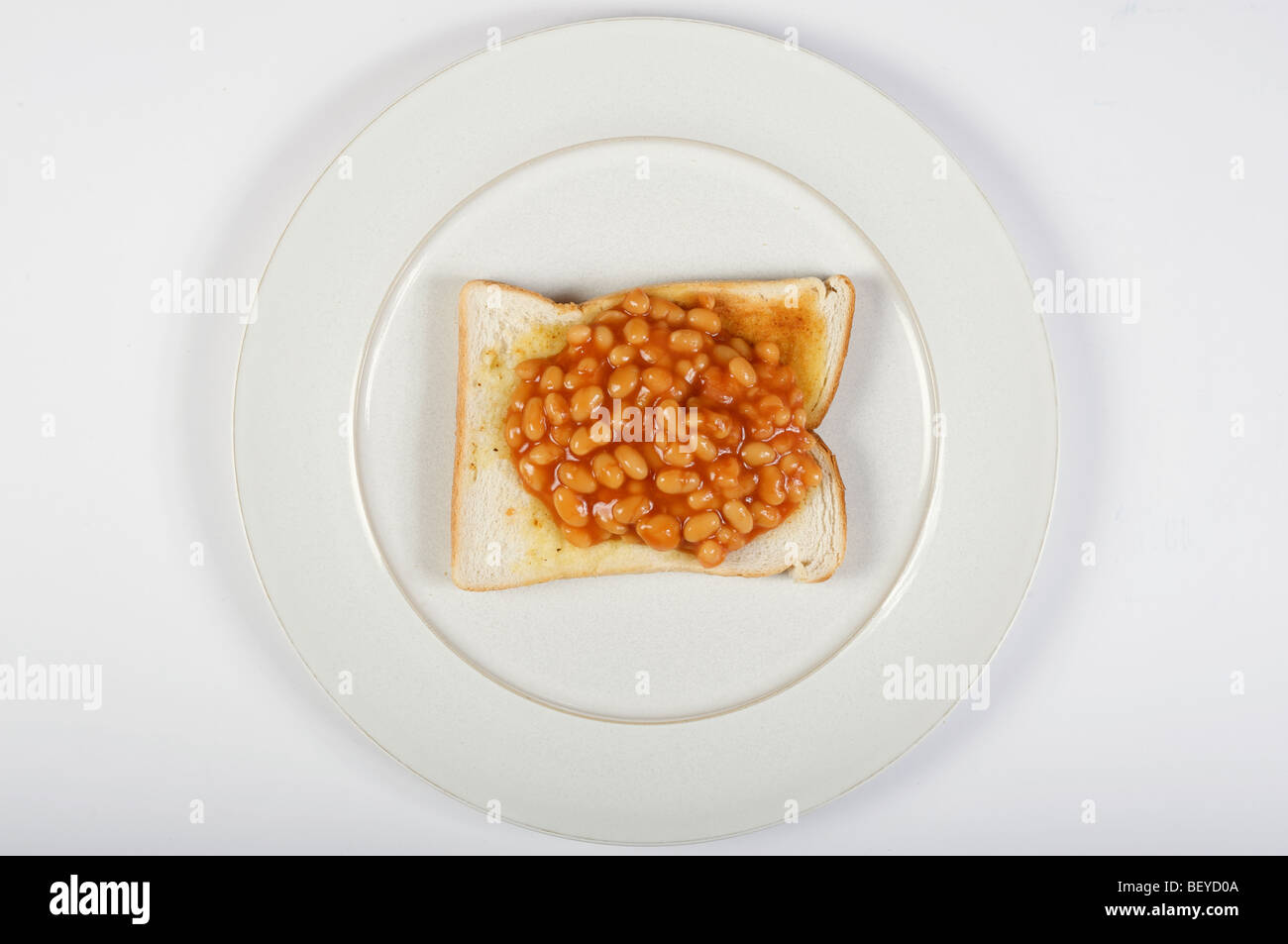 Beans on toast, a traditional British snack Stock Photo - Alamy