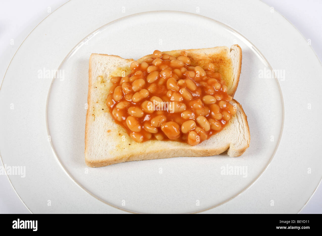 Beans on toast, a traditional British snack Stock Photo - Alamy