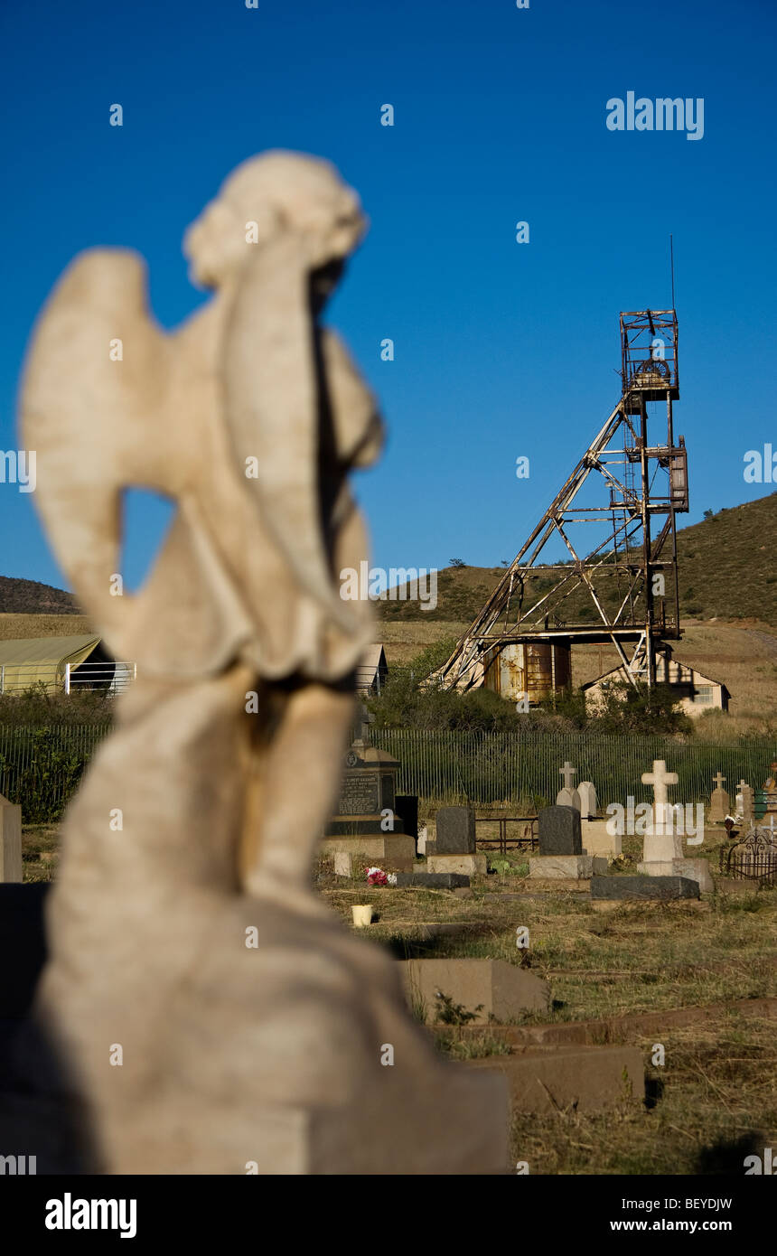 A "cherub" "headstone" with a "Mining Elevator" in the background at ...