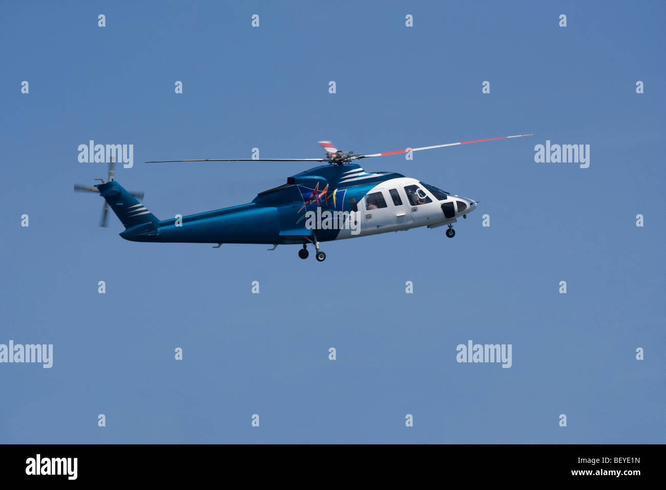 Blue Helicopter in Flight - Near Victoria, Vancouver Island, British ...