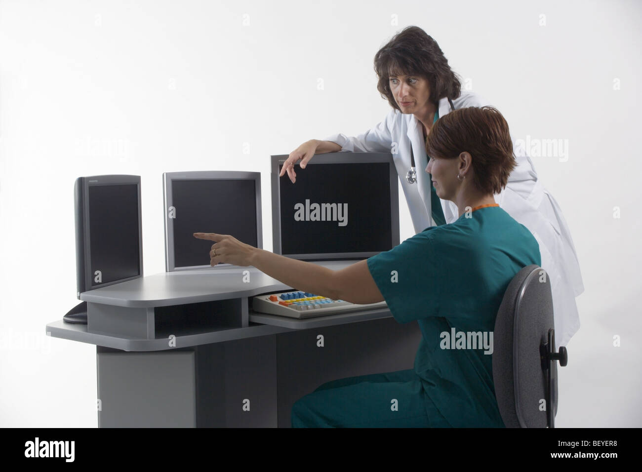 Computer Technicians in Lab Coats, Silouette Stock Photo - Alamy