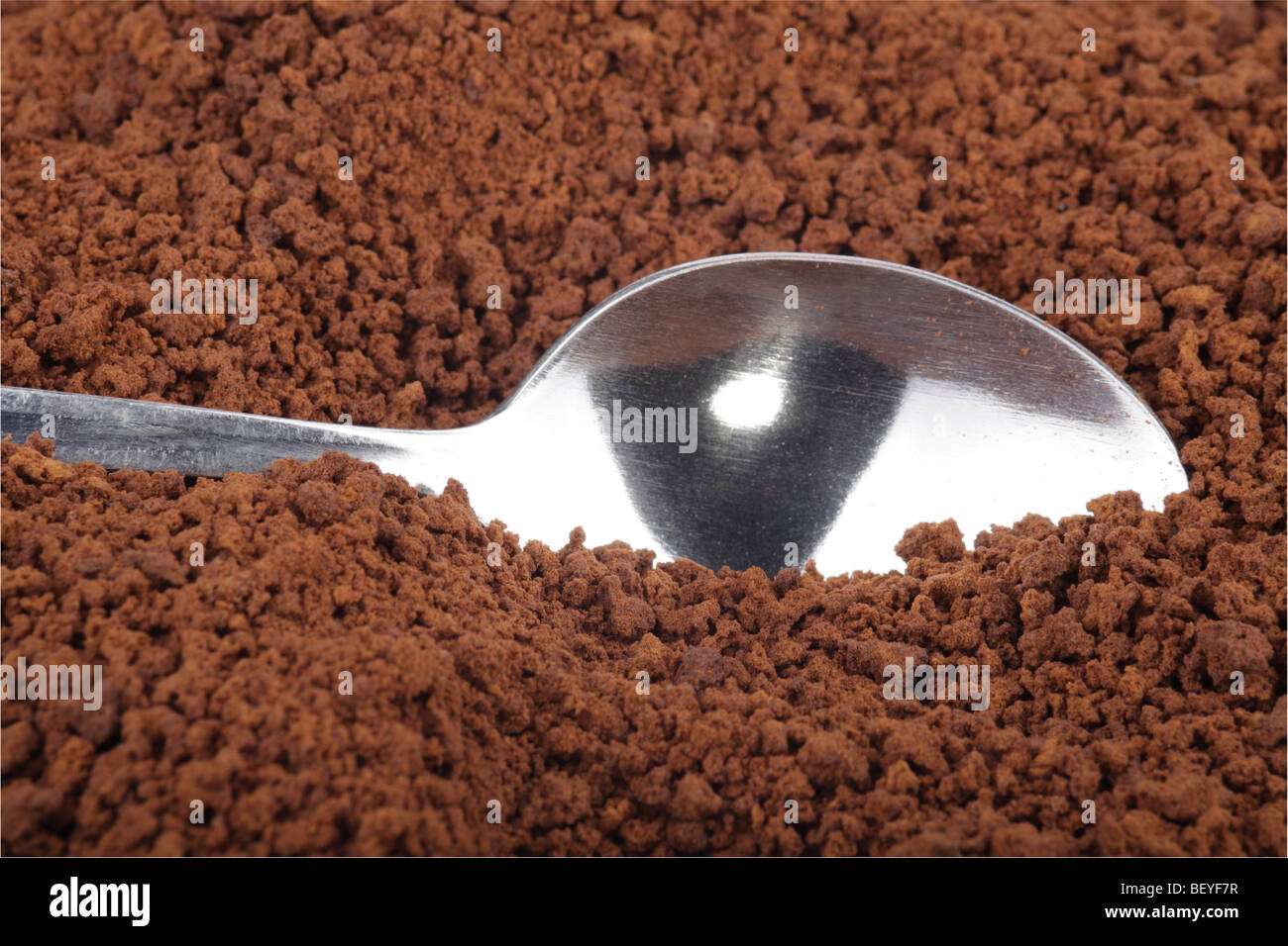 instant coffee background and teaspoon Stock Photo - Alamy