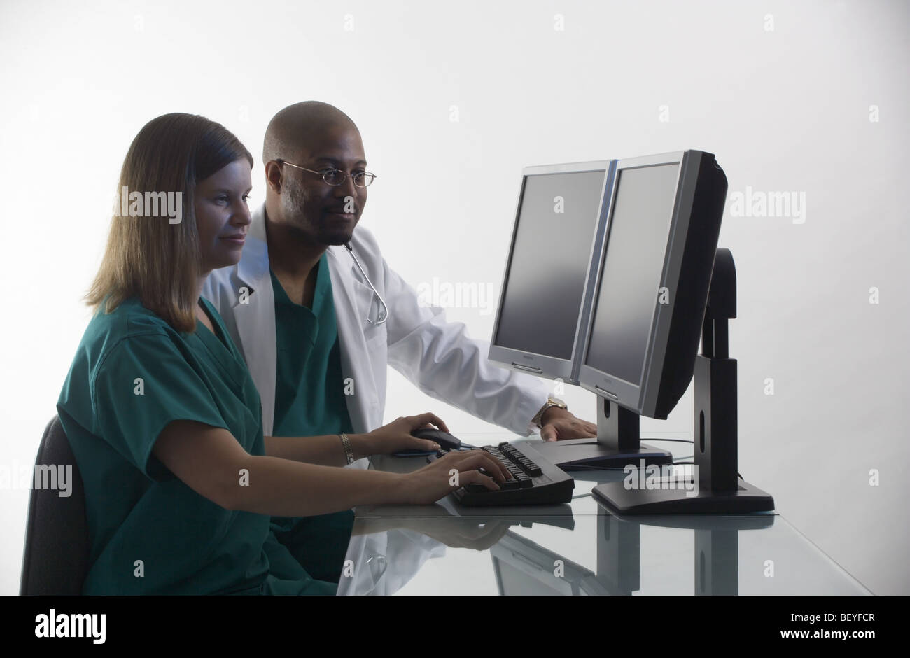 Computer Technicians in Lab Coats, Silouette Stock Photo - Alamy