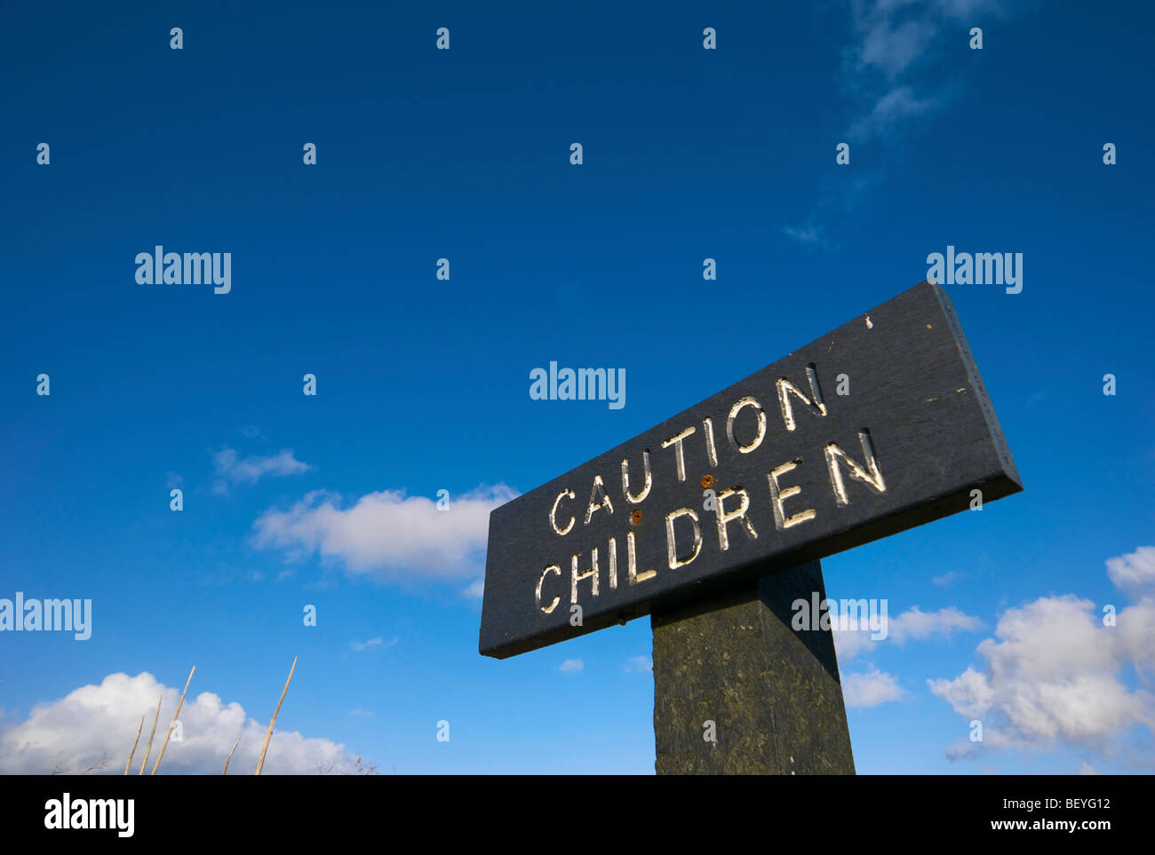 Sign saying Caution Children Stock Photo - Alamy
