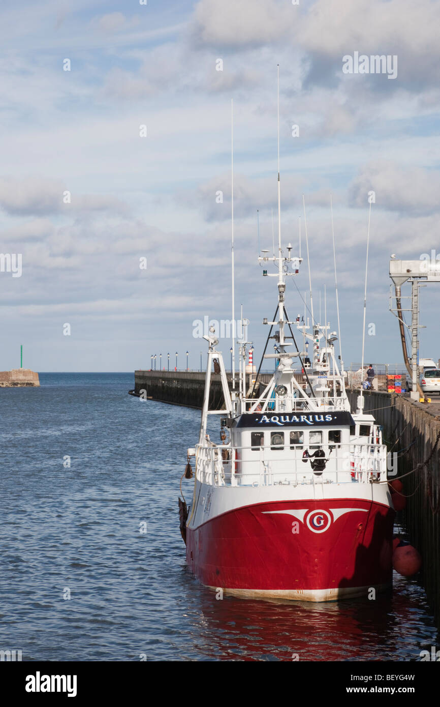Amble, Northumberland, England, UK, Europe. Fishing boat in dock on the ...