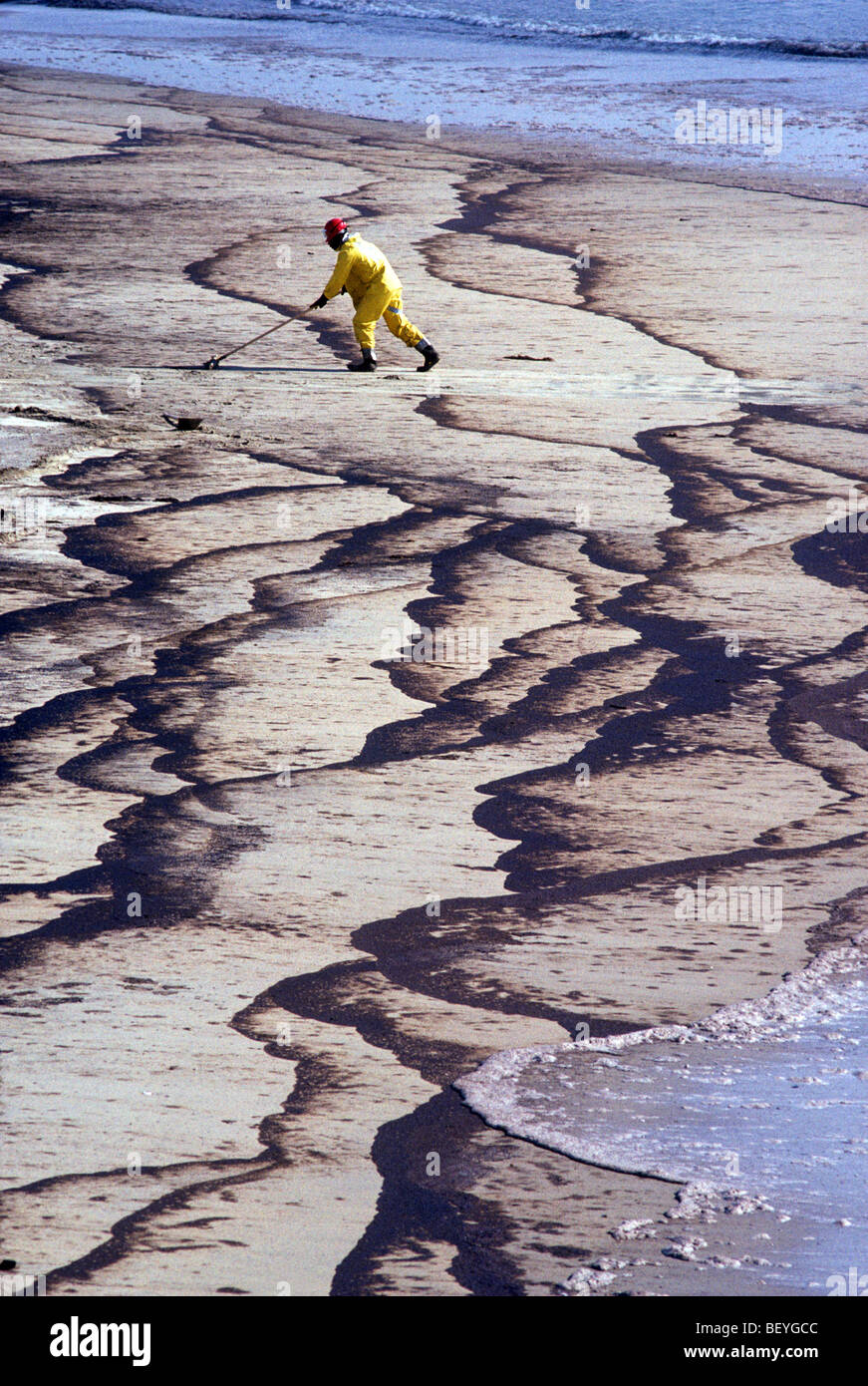 Oil spill clean up on beach Stock Photo - Alamy