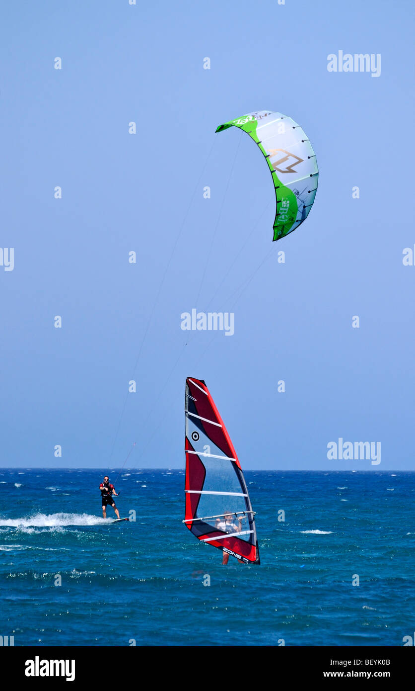 Windsurfing and kite-surfing on a windy day at Prasonisi, Rhodes island ...