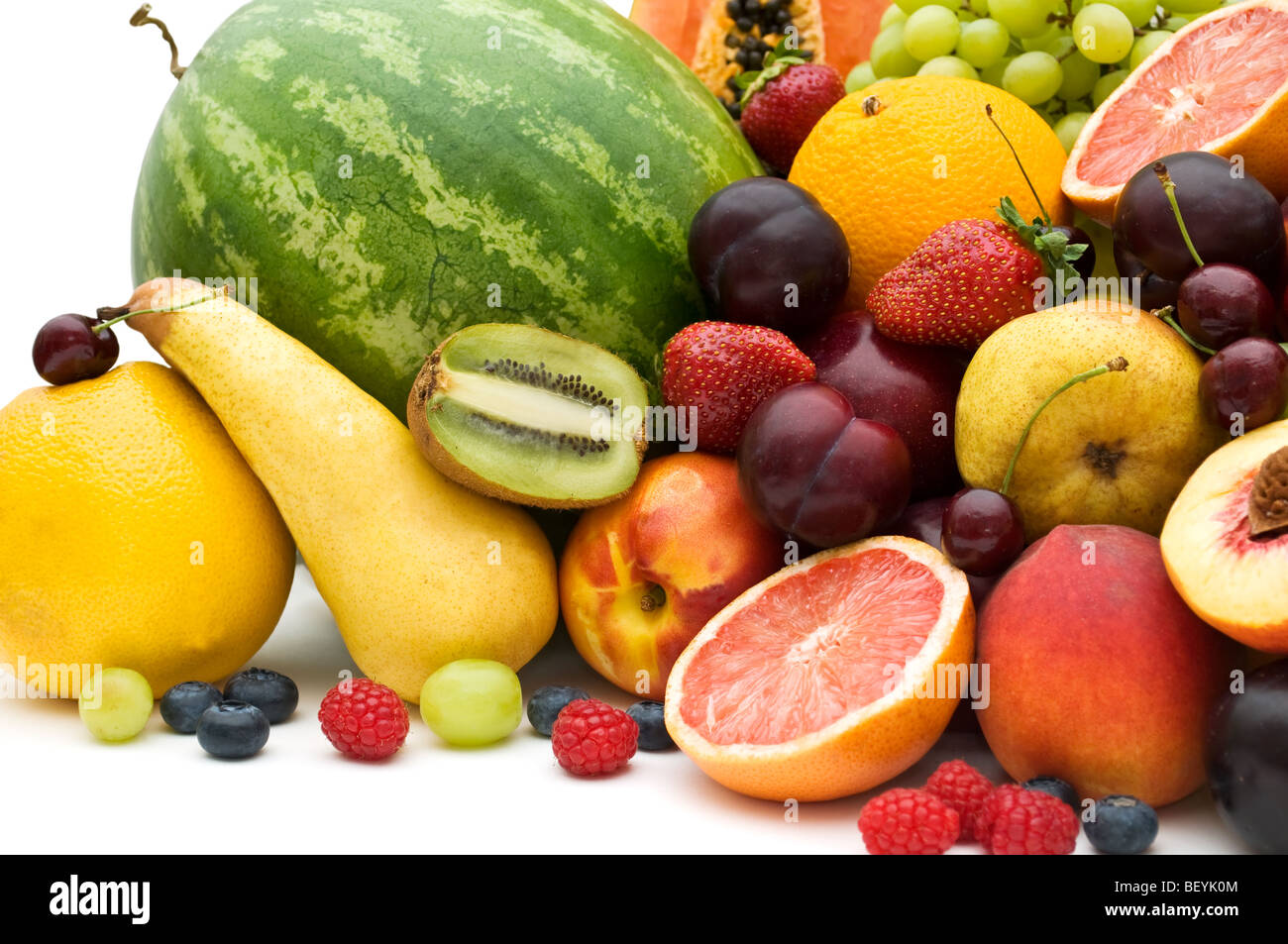 Composition of fresh fruit on a white background Stock Photo - Alamy