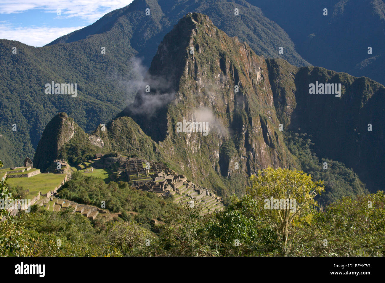 The ruins of Machu Picchu taken from high above at the Inca Sun gate in ...
